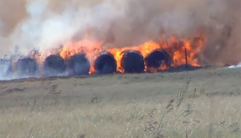 Fire burns 80 acres, 200 large bales of hay in Adair County